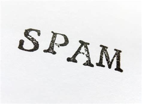 Premium Photo Close Up Of Spam Text On White Paper