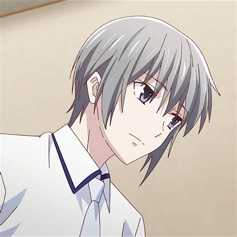 An Anime Character With Grey Hair And Blue Eyes
