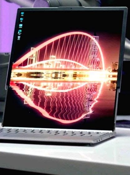 Free Photo Lenovo Showcases Concept Laptop With Rollable Display