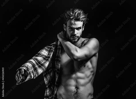 Sexy Young Handsome Naked Man With Messy Hair Wears Plaid Shirt On