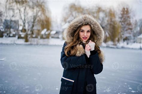Beautiful Brunette Girl In Winter Warm Clothing Model On Winter Jacket