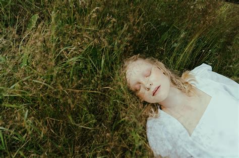 Woman Lying In Grass Photos Download The Best Free Woman Lying In