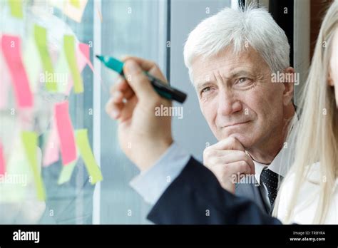 Group Of Business People Brainstorming Ideas Entrepreneurs Having A Standing Meeting Discussing