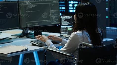 person with paraplegia in inclusive server hub overseeing data center