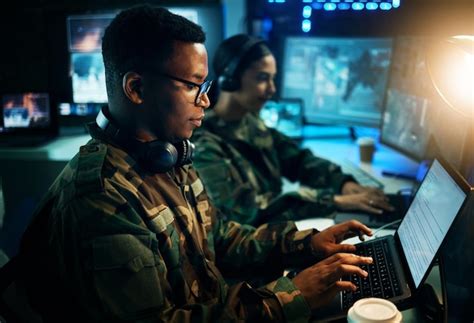Premium Photo Military Control Room Computer And Soldier At Desk Typing Code And Tech For