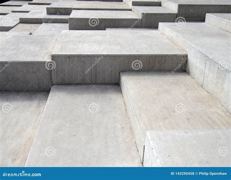 Angular Geometric Mirror Cladding On A Modern Building With Repeating Structure And Reflected