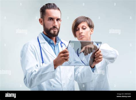 High Tech Healthcare Analysis In Action With A Man And Woman Deeply
