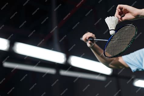 Premium Photo Player Hitting Shuttlecock