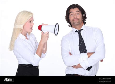Girl With Loudspeaker And Man Stock Photo Alamy