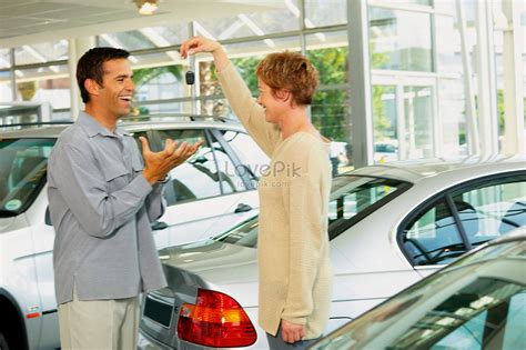 Woman Handing Keys To Man Picture And HD Photos Free Download On Lovepik