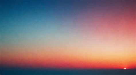 Premium Photo A Sunset With A Pink And Blue Sky In The Background