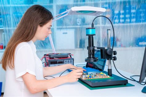 Woman Worker In Laboratory Of Electronics Devices Stock Photo Image Of Engineering Assembly