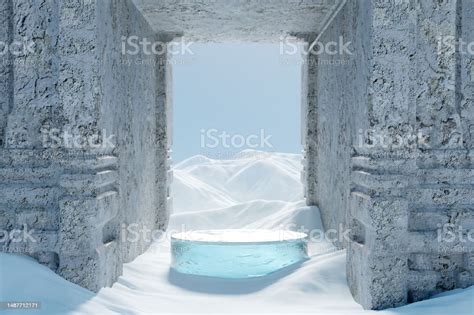 Abstact 3d는 겨울 장면과 자연 배경 돌 아치 문 배경의 눈밭에 얼음 연단을 렌더링하고 제품 전시 광고 등을 위한 맑은 하늘을 렌더링합니다 문에 대한 스톡 사진 및