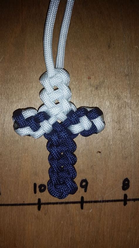 550 Paracord Cross. Tied using a vertical crown knot. in 2024 | Plastic canvas patterns, Cross ...
