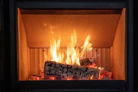 Fire Flames And Burning Wood Logs Energy Stove Fireplace Close Up