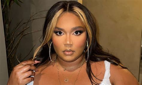 Lizzo Turns Up The Heat In Stunning Bikini Clad Photos During Beach