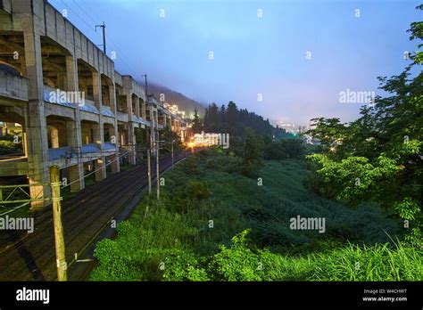 The Joetsu Line Runs Parallel To The Raised Tracks Of The Joetsu