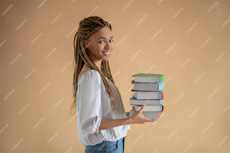 Female Carrying Books