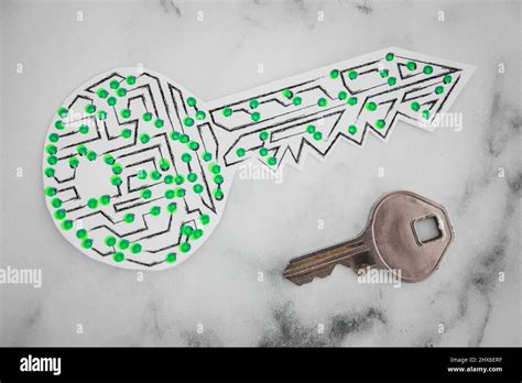 encryption key icon made of circuits and led lights next to old metal