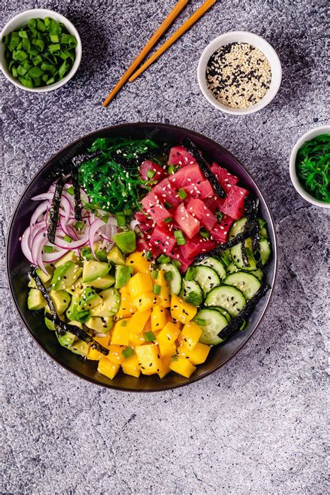 Premium Photo Hawaiian Tuna Poke Bowl With Seaweed Avocado Mango Cucumber
