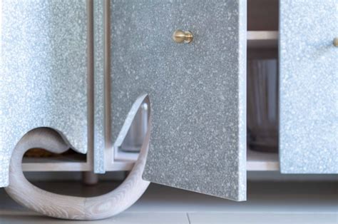 Masque Thing Cabinet Features Stretchy Doors And Sumptuous Legs