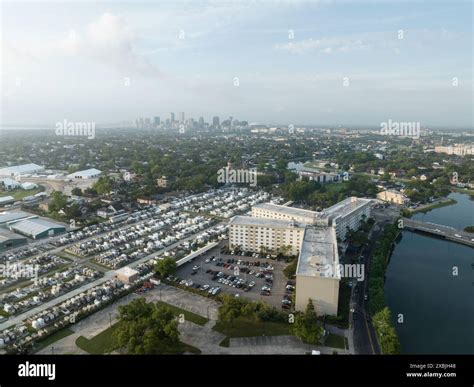 Aerial View Of The Historic Bayou St John Winding Through A Lush New Orleans Neighborhood With