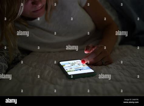Person Scrolling On Phone Hi Res Stock Photography And Images Alamy