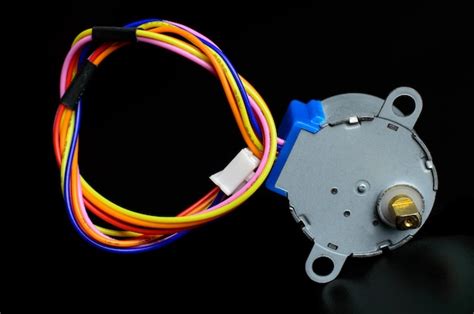Premium Photo Electronic Stepper Motor With Colorful Wires On A Black