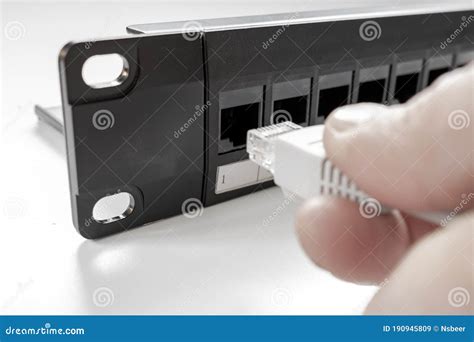 Close Up Of A Cat5e 24 Port Patch Panel Showing An Ethernet Patch Lead Connected To Port One Of