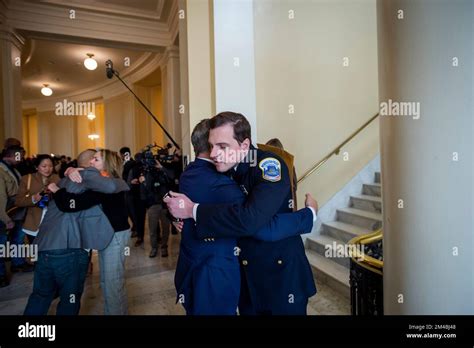 Former Capitol Police Sergeant Aquilino Gonell Left Is Embraced By United States