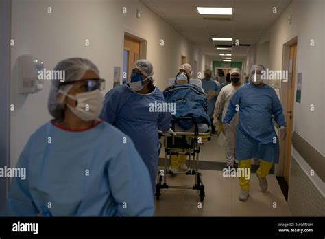 Medical Workers Move New Coronavirus Patient Rosane Pacheco To Be Treated At The Dr Ernesto Che