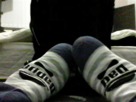 Showing Off His Socked Feet