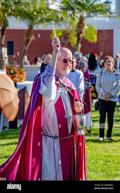 Sprinkling Holy Water With An Aspergillum A Bishop Conducts A
