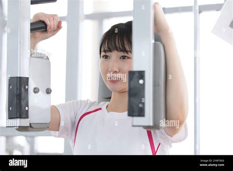 Japanese Woman Doing Muscle Training Stock Photo Alamy