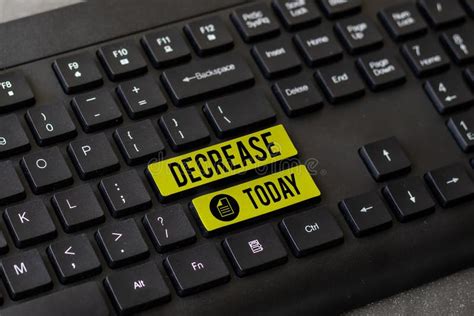 Hand Writing Sign Decrease Concept Meaning Make Or Become Smaller Or Fewer In Size Amount