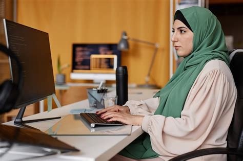 Premium Photo Successful Muslim Woman As Female Programmer Coding In
