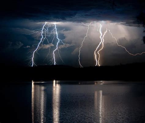 Premium Photo Reflection Of Lightning On Lake At Night Premium Photo Reflection Of Lightning On Lake At Night