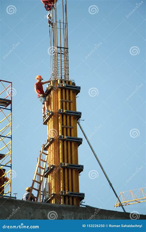 Assembling Of Crane On Dramatic Cloudy Background Height Tower Crane Editorial Image