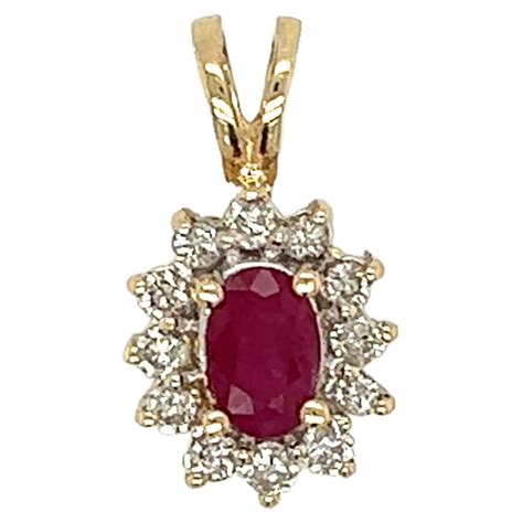 Oval Ruby And Diamond Halo Pendant In 14k Yellow Gold At 1stdibs