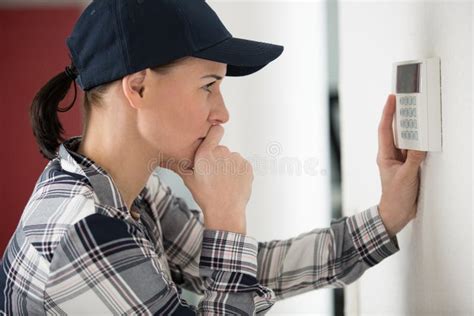 Female Electrician Installing Security System Stock Image Image Of Motion Person 210147833