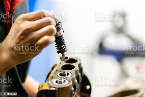 Closeup Photos Of Assembling Engine Parts Or Machines That Have