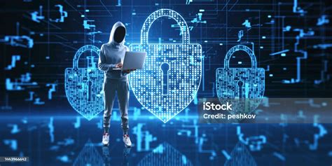 Hacker Using Laptop With Creative Glowing Digital Padlock Hologram On Blurry Dark Backdrop