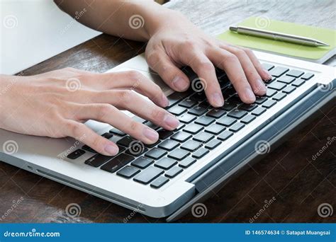 Man Is Typing On Laptop Keyboard Stock Photo Image Of Coding Fingers 146574634