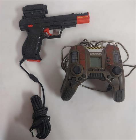 Lot A Radica Gamester Fps Master Controller And Joytech Sharp Shooter