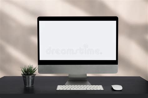 Workspace With Simulated Blank White Screen Computers And Office