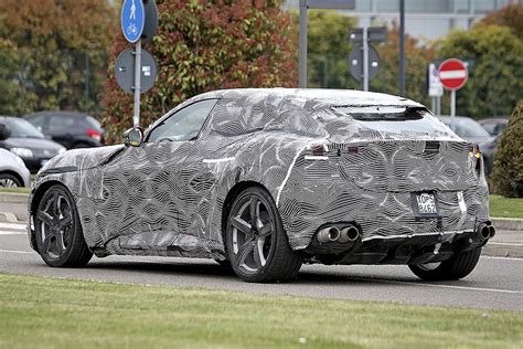 Spy Pics Ferrari Purosangue Sheds Camo In Maranello Au