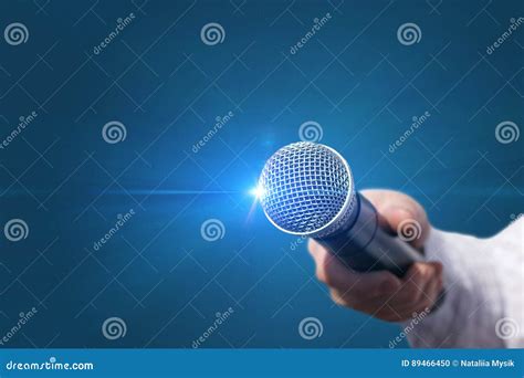 Female Hand With Microphone Stock Photo Image Of Business Performance
