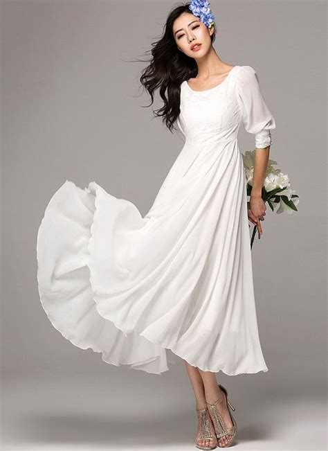 Half Sleeve White Maxi Dress With Lace Details On The Front Bodice And Cuff