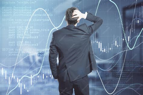 Premium Photo Stock Market Analytics Concept With Businessman Holding