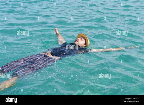 Floating Man Body Sea Clothes Hi Res Stock Photography And Images Alamy